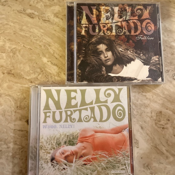 None | Media | Nelly Furtado 2 Cds Whoa Nelly And Folklore | Poshmark